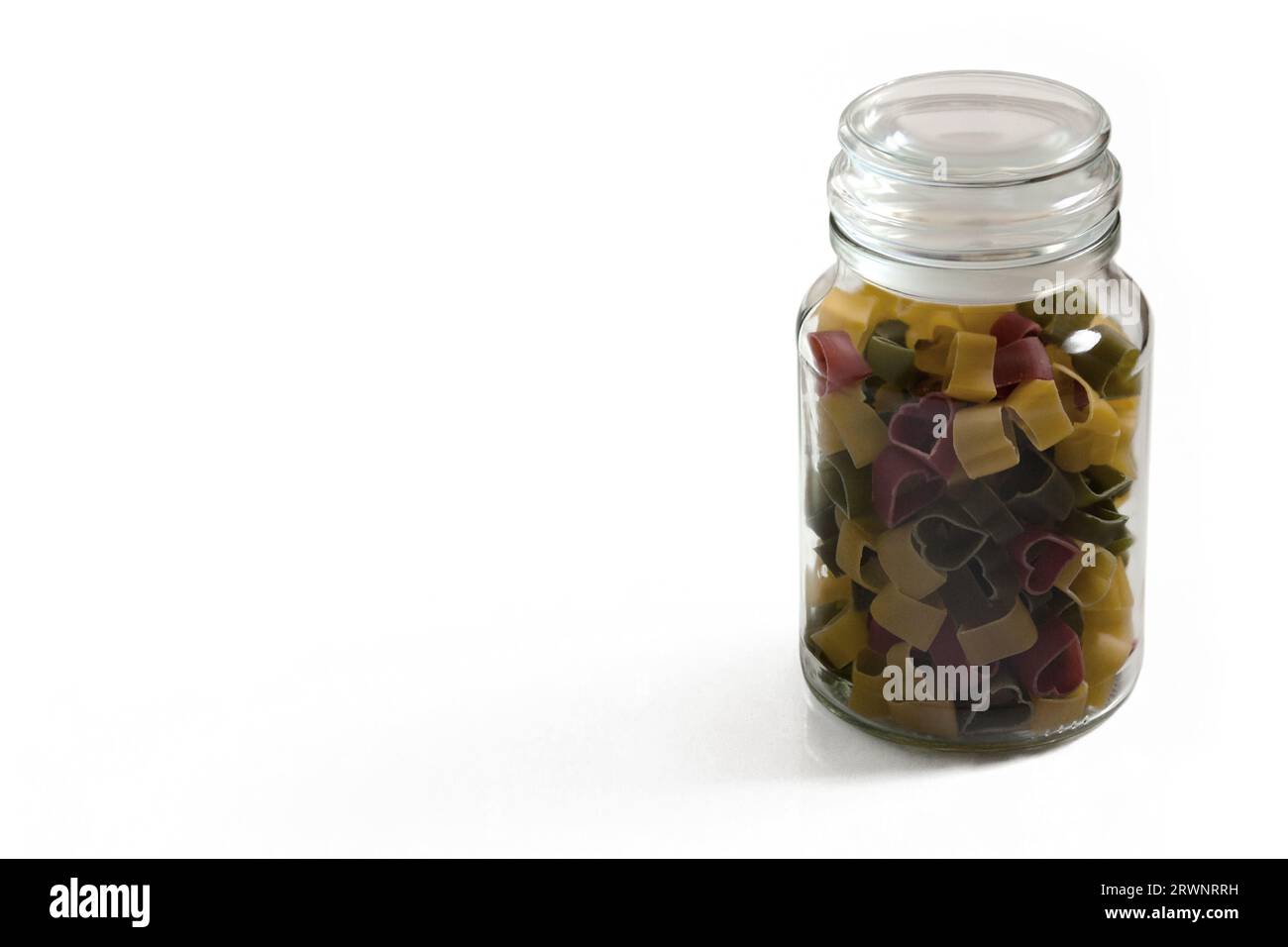 Studio shot of a jar of cuoricini on white background Stock Photo - Alamy