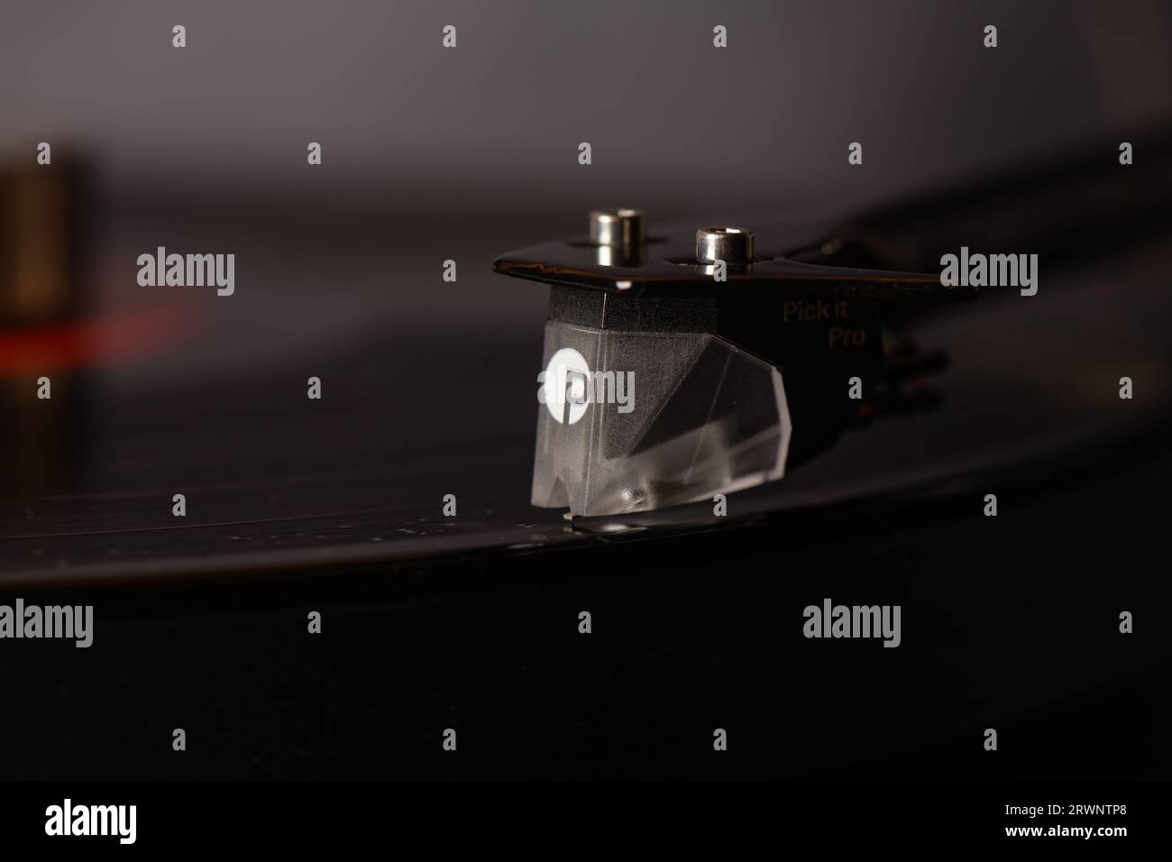 Pro-ject cartridge and stylus on a tonearm of a record player turntable ...