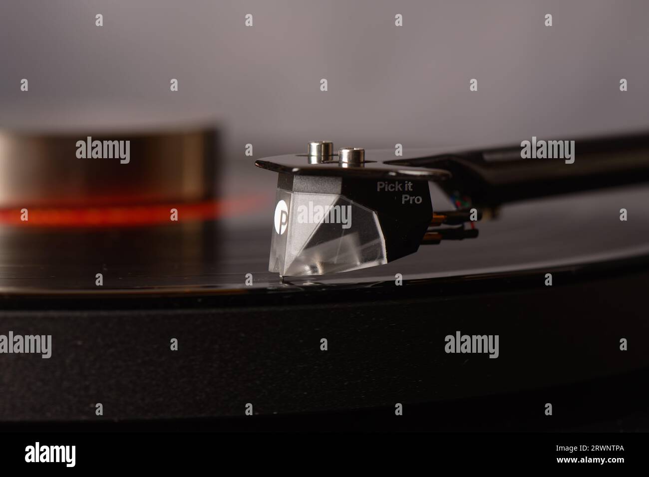 Pro-ject cartridge and stylus on a tonearm of a record player turntable ...