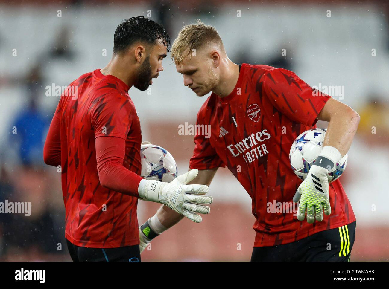 Arsenal goalkeepers David Raya (left) and Aaron Ramsdale warming up ...
