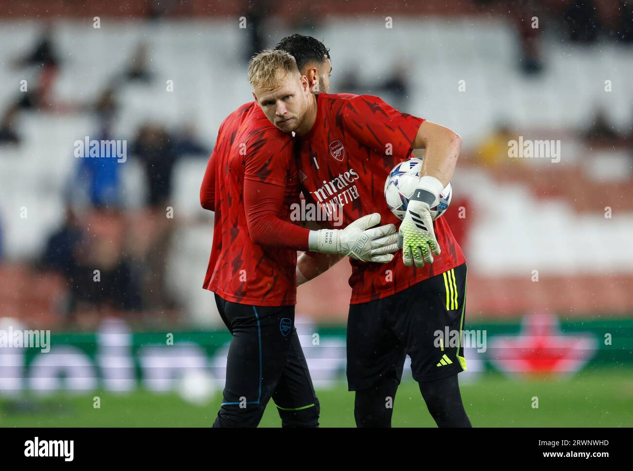 Arsenal goalkeepers David Raya (left) and Aaron Ramsdale warming up ...