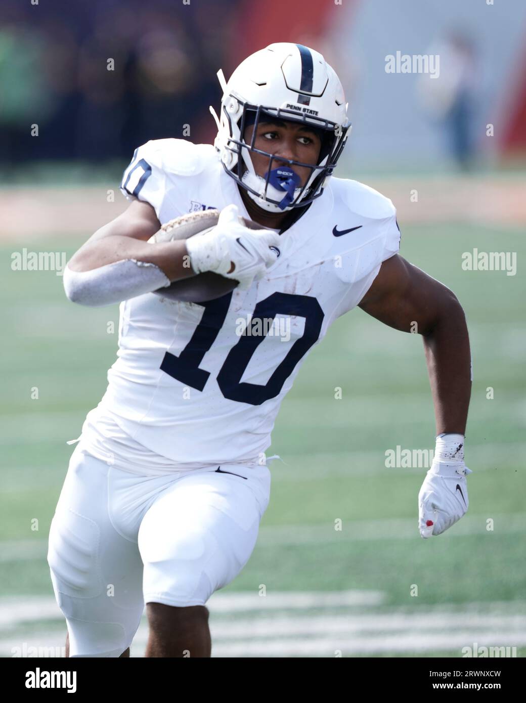 Penn State running back Nicholas Singleton carries the balls during an ...