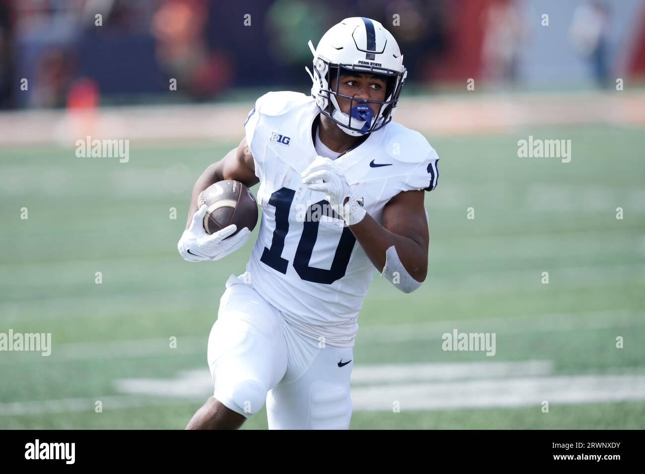 Penn State running back Nicholas Singleton carries the balls during an ...