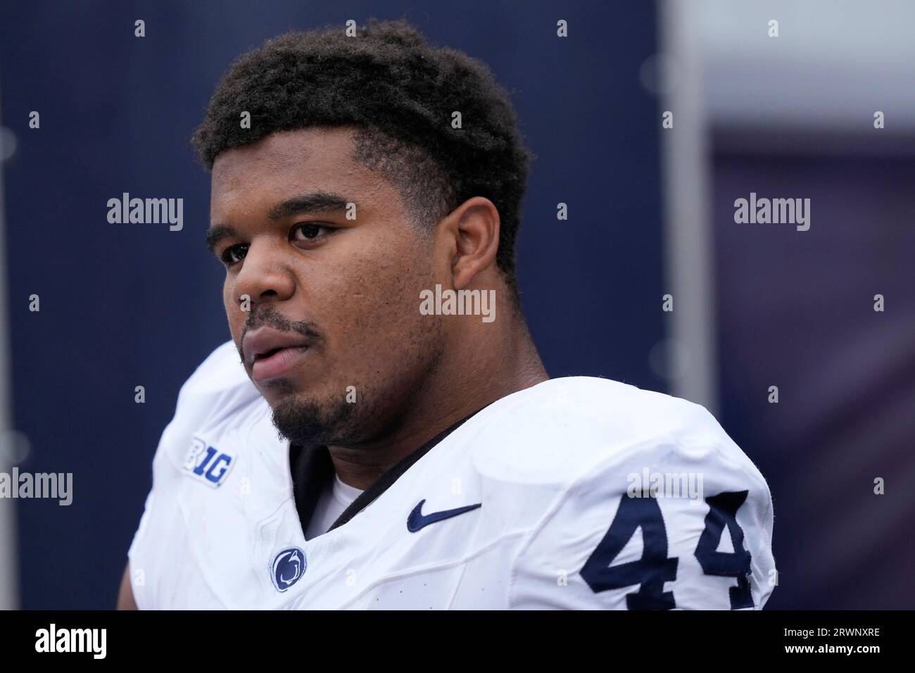 Penn State defensive end Chop Robinson sits on the bench during an NCAA ...