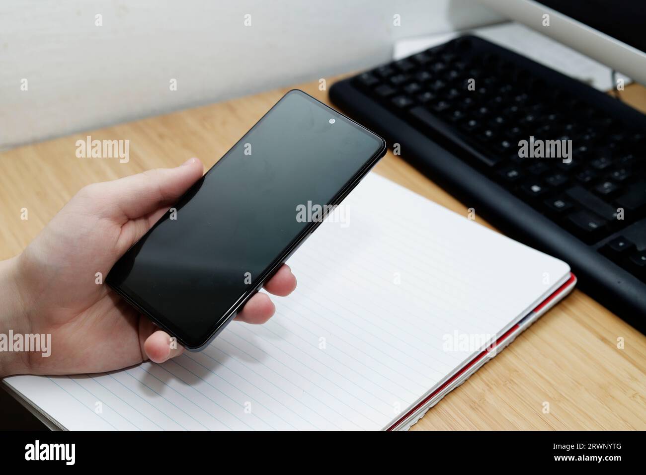 Phone on desk hi-res stock photography and images - Alamy