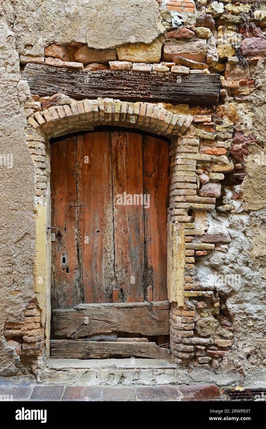 Destroyed wooden door of an ancient house Stock Photo - Alamy