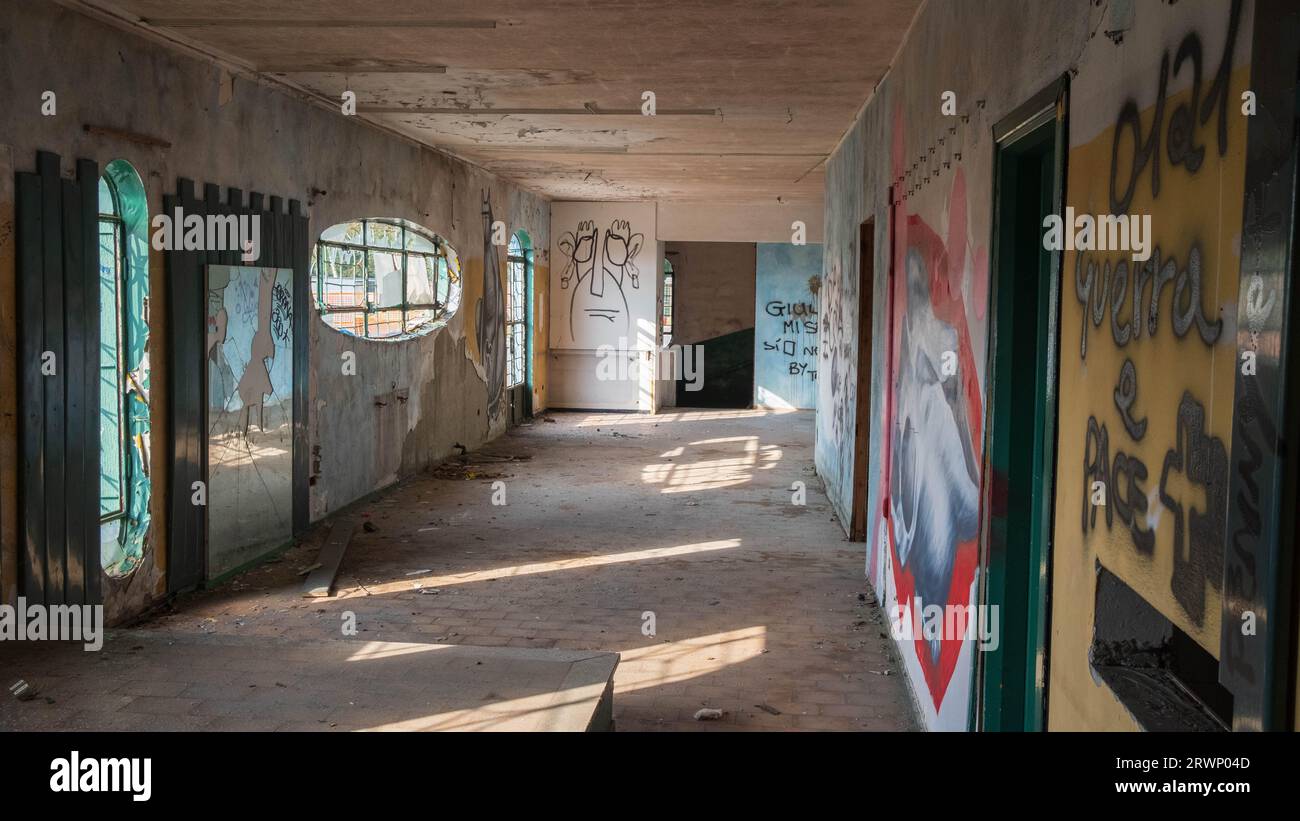 Old swimming pool center full of trash, rubbish, overgrown facility in ...