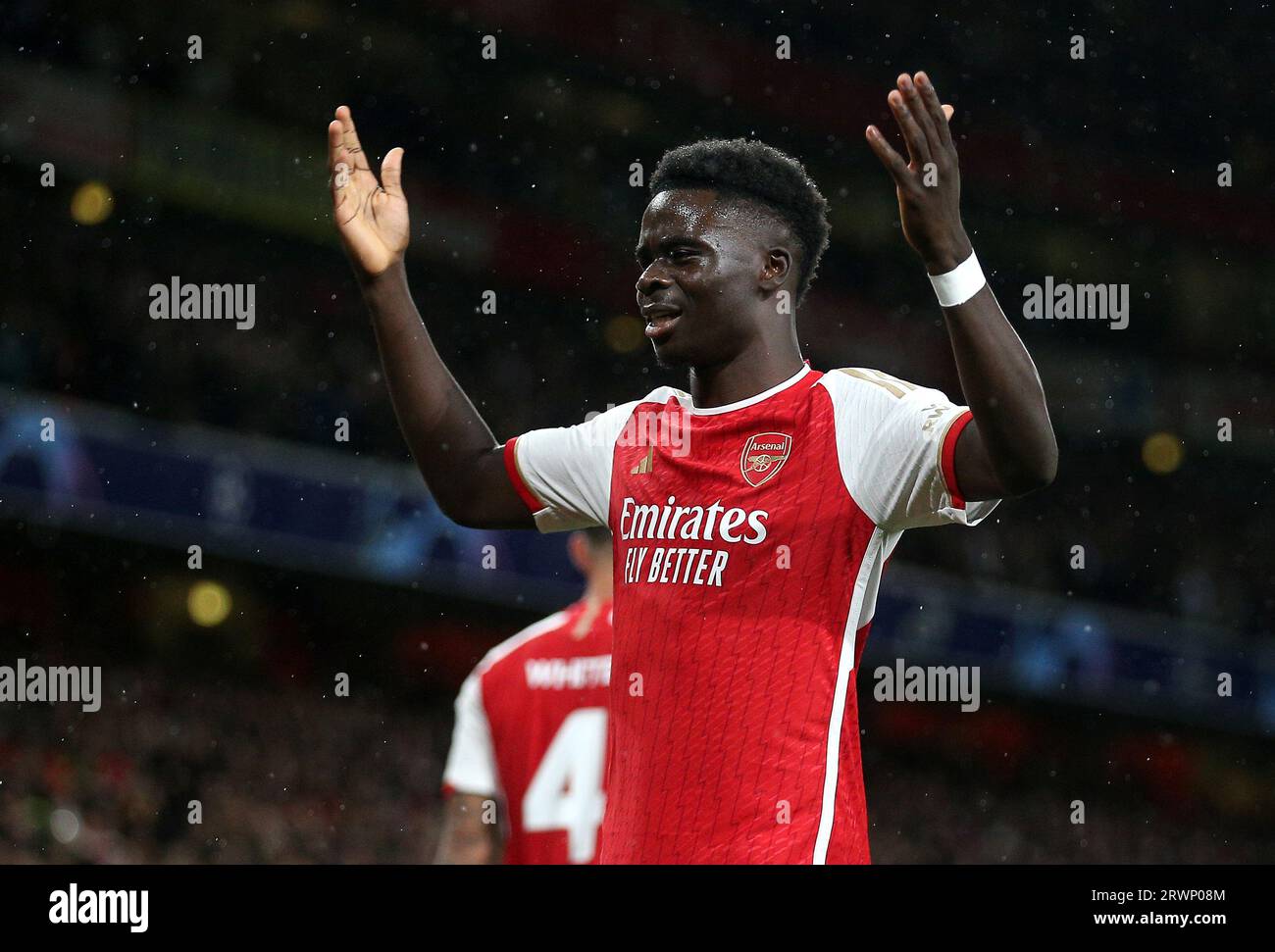 Arsenal's Bukayo Saka celebrates scoring their side's first goal of the ...