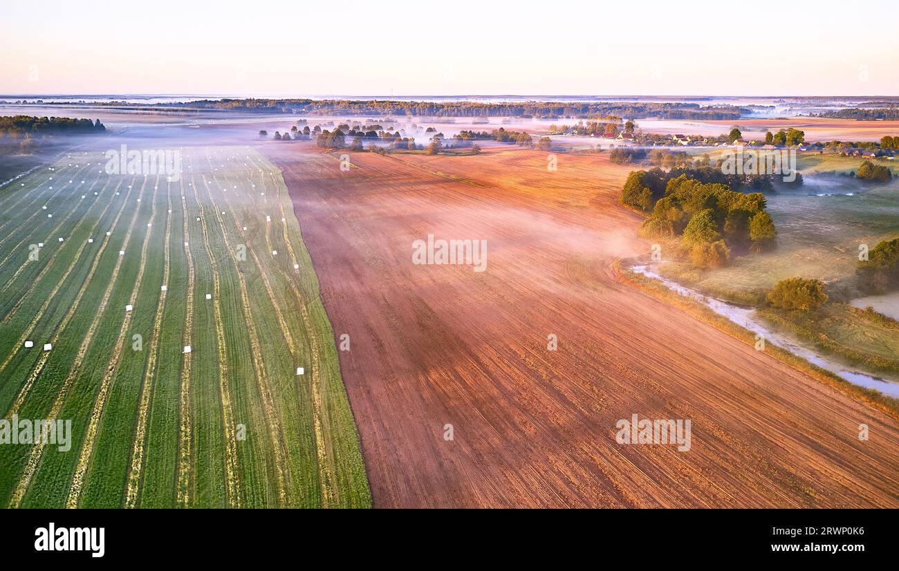 Warm sunny September morning. Autumn beautiful fog landscape. Small ...