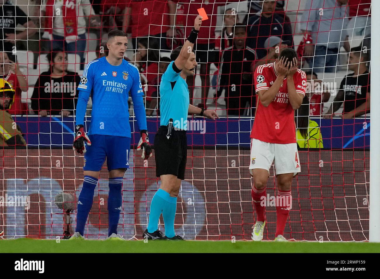 Turkish referee Halil Umut Meler shows a red card to Benfica's Antonio ...