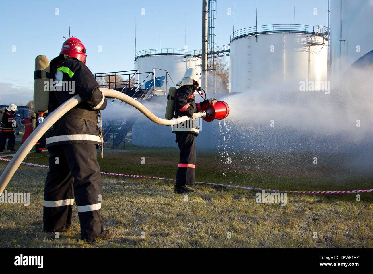 Red spray water tank hi-res stock photography and images - Alamy