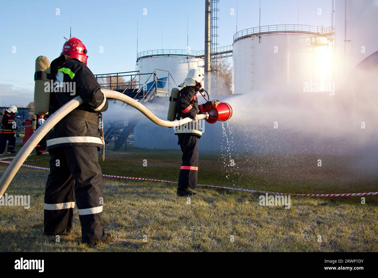 Red spray water tank hi-res stock photography and images - Alamy