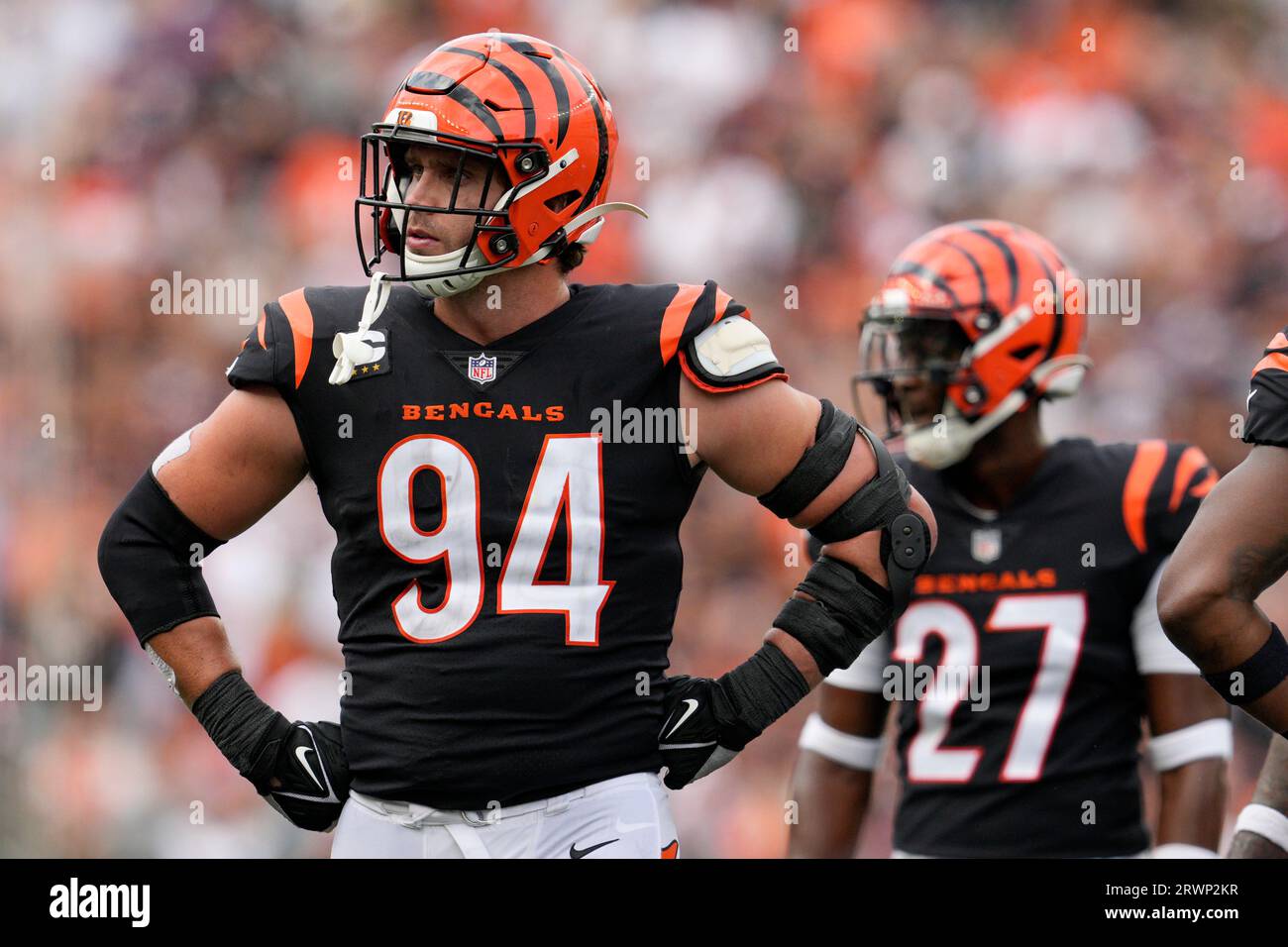 Cincinnati Bengals' Sam Hubbard (94) and Jordan Battle (27) play during ...