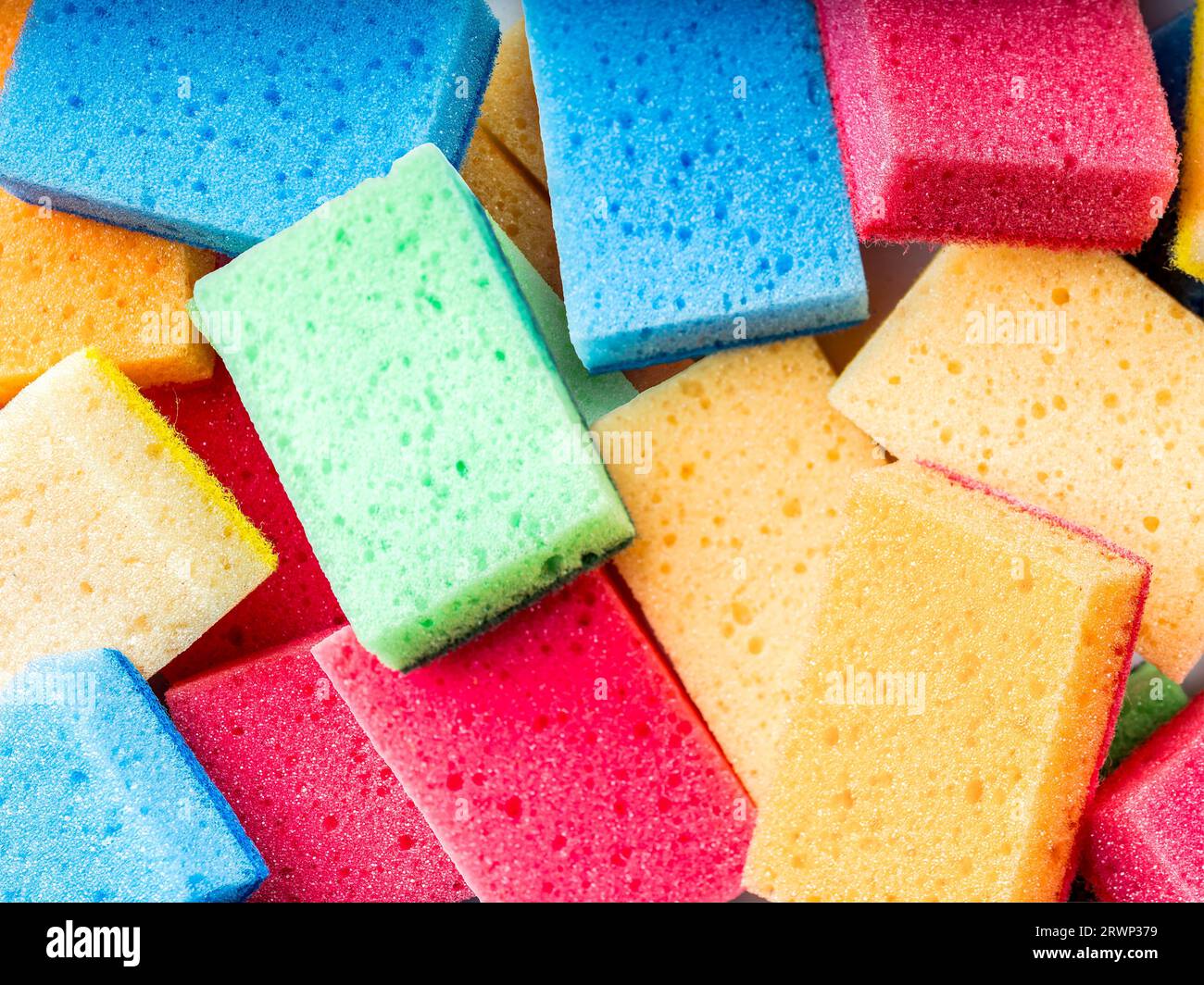 Pile of colorful kitchen sponges shot from above Stock Photo - Alamy