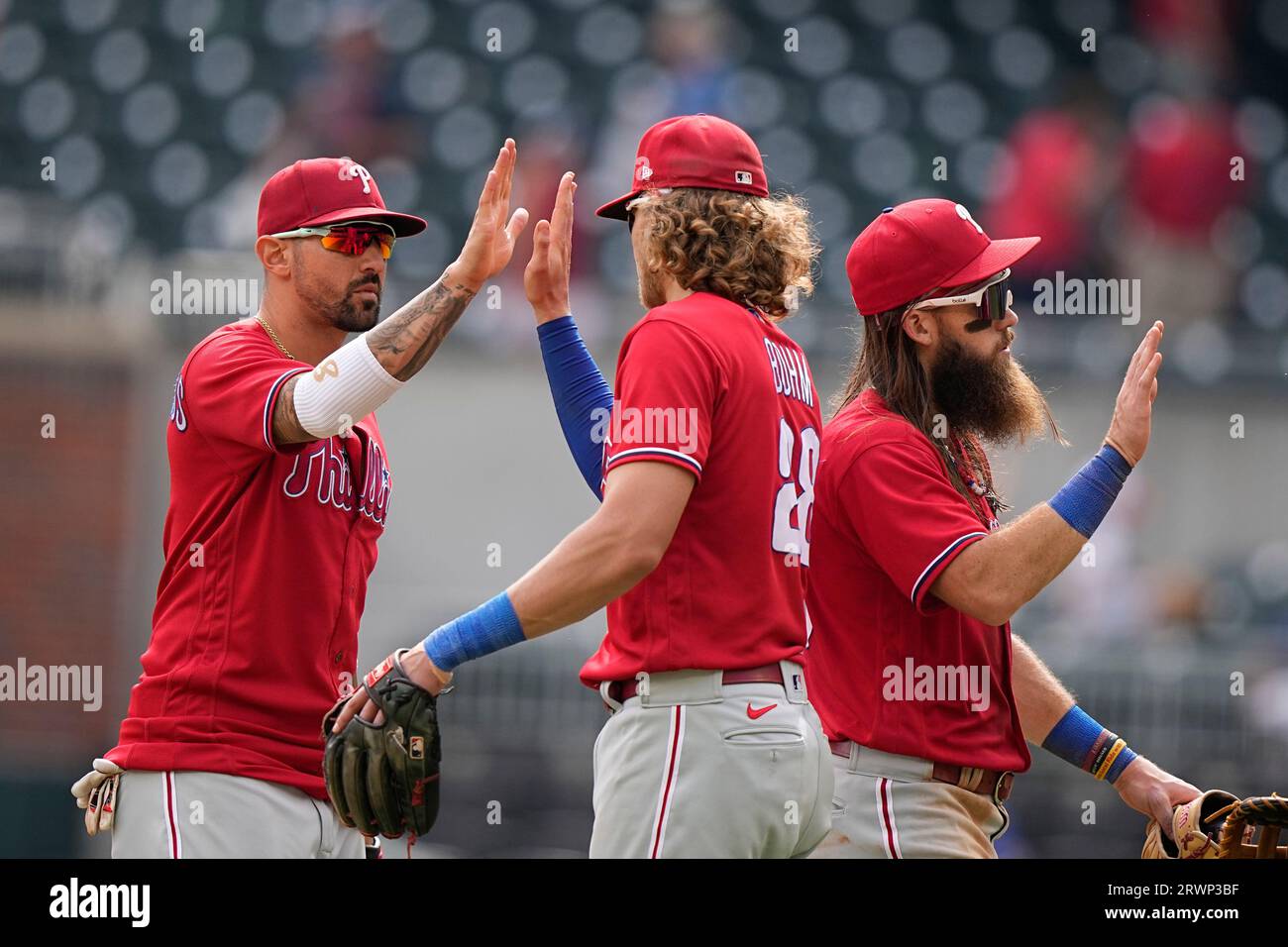 Philadelphia Phillies right fielder Nick Castellanos, left, high fives ...