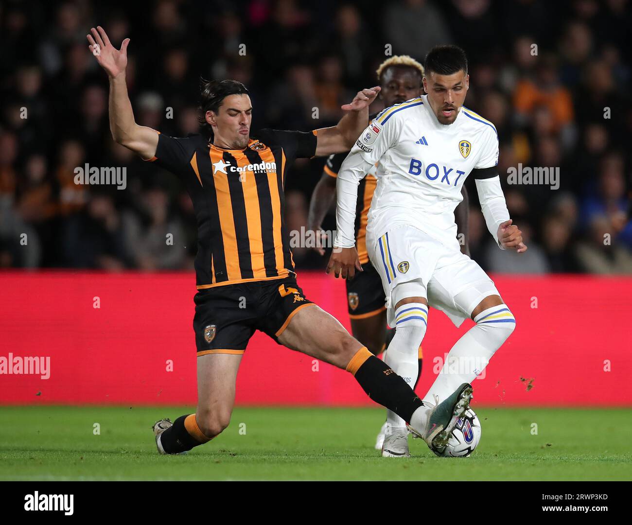 Hull City's Jacob Greaves (left) and Leeds United's Joel Piroe battle ...