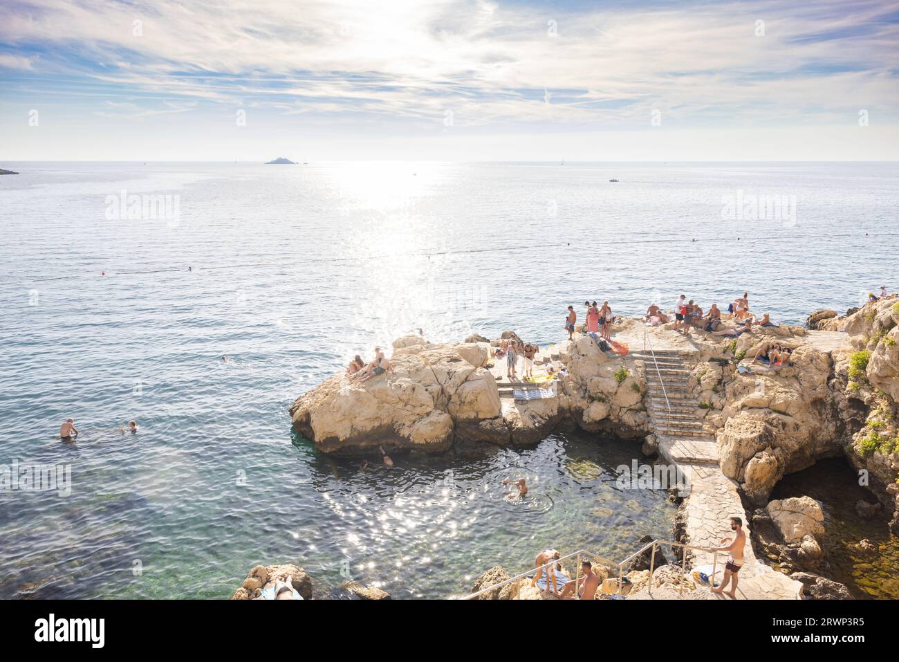 Rovinj, CROATIA - September 11, 2023: People sunbathing and swimming ...