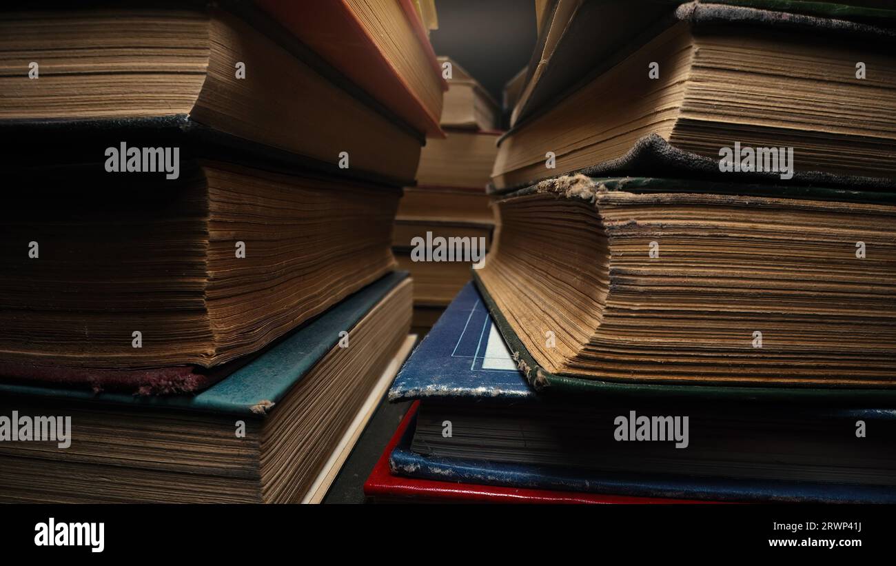 Library stack old books slider hi-res stock photography and images - Alamy