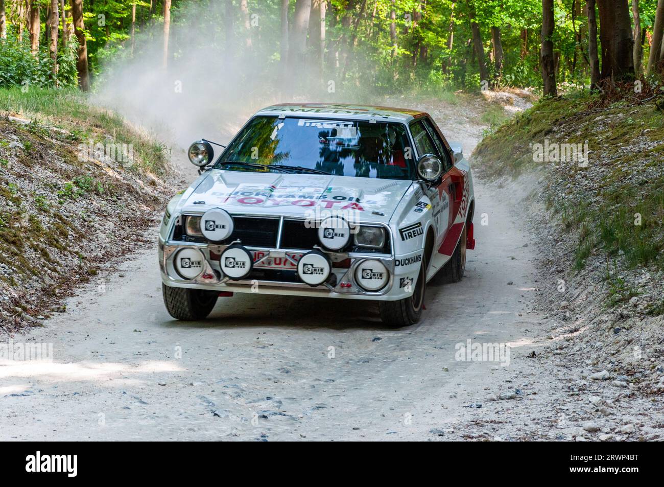 Toyota Celica Twin-Cam Turbo racing on the rally stage at the Goodwood ...