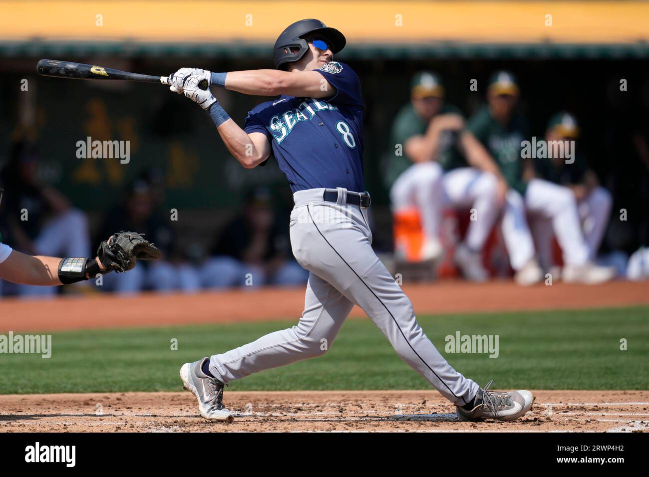 Seattle Mariners' Dominic Canzone (8) hits a two-run home run against ...