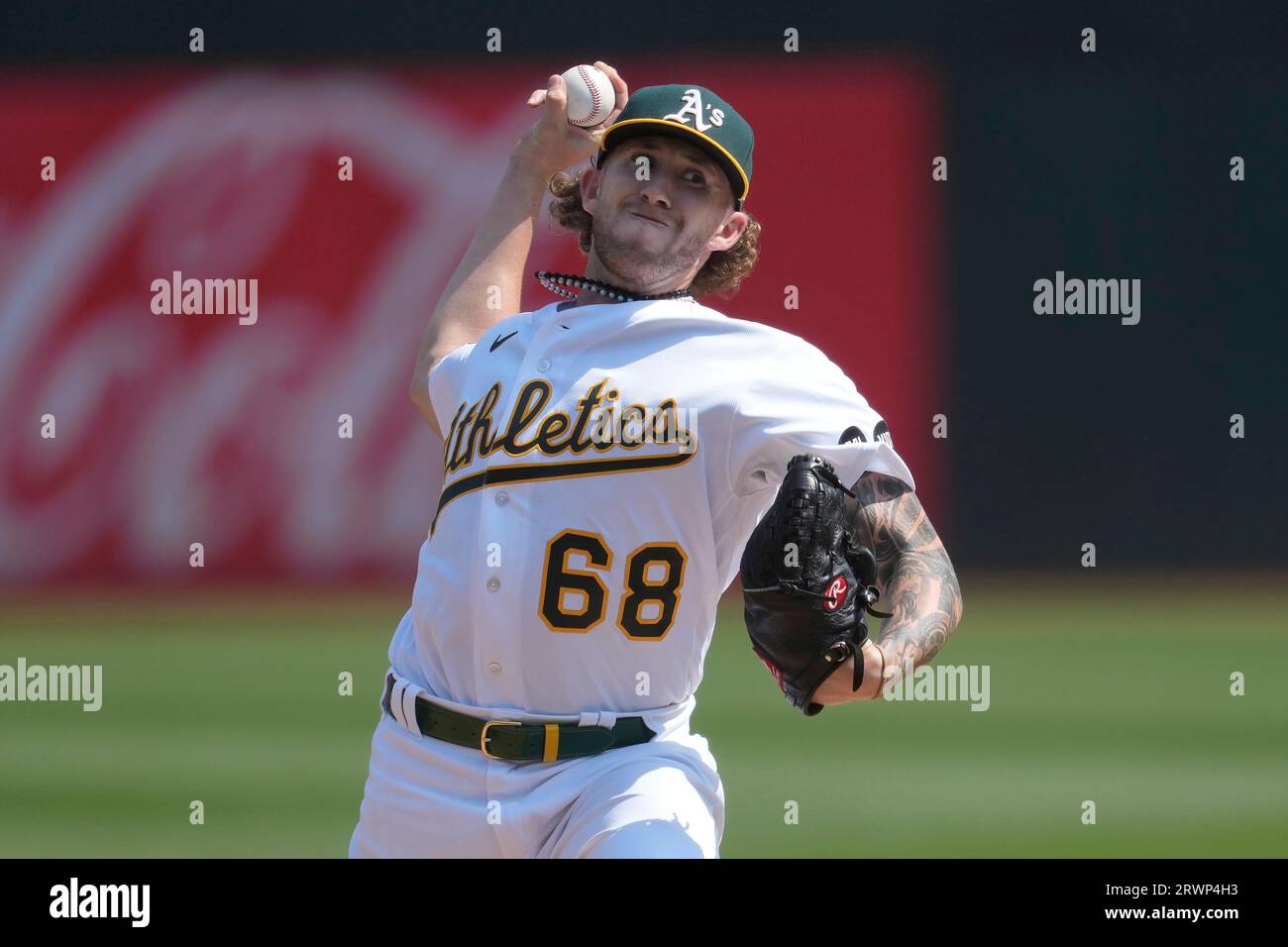 Oakland Athletics pitcher Joey Estes works against the Seattle Mariners ...