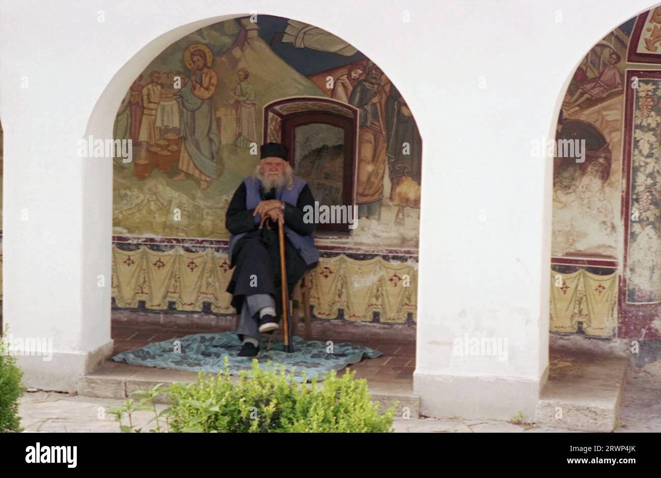 Old monk with cane hi-res stock photography and images - Alamy