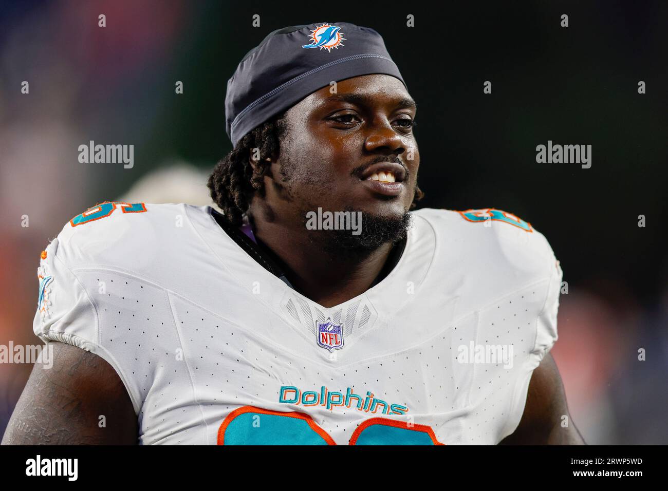 Miami Dolphins guard Lester Cotton (66) reacts after defeating the New ...