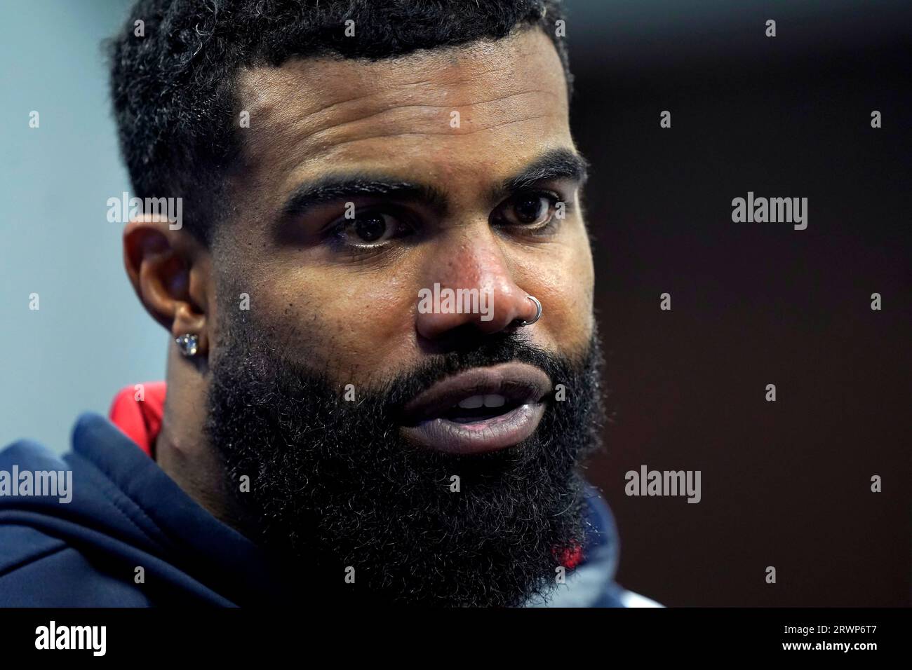 New England Patriots running back Ezekiel Elliott takes questions from ...
