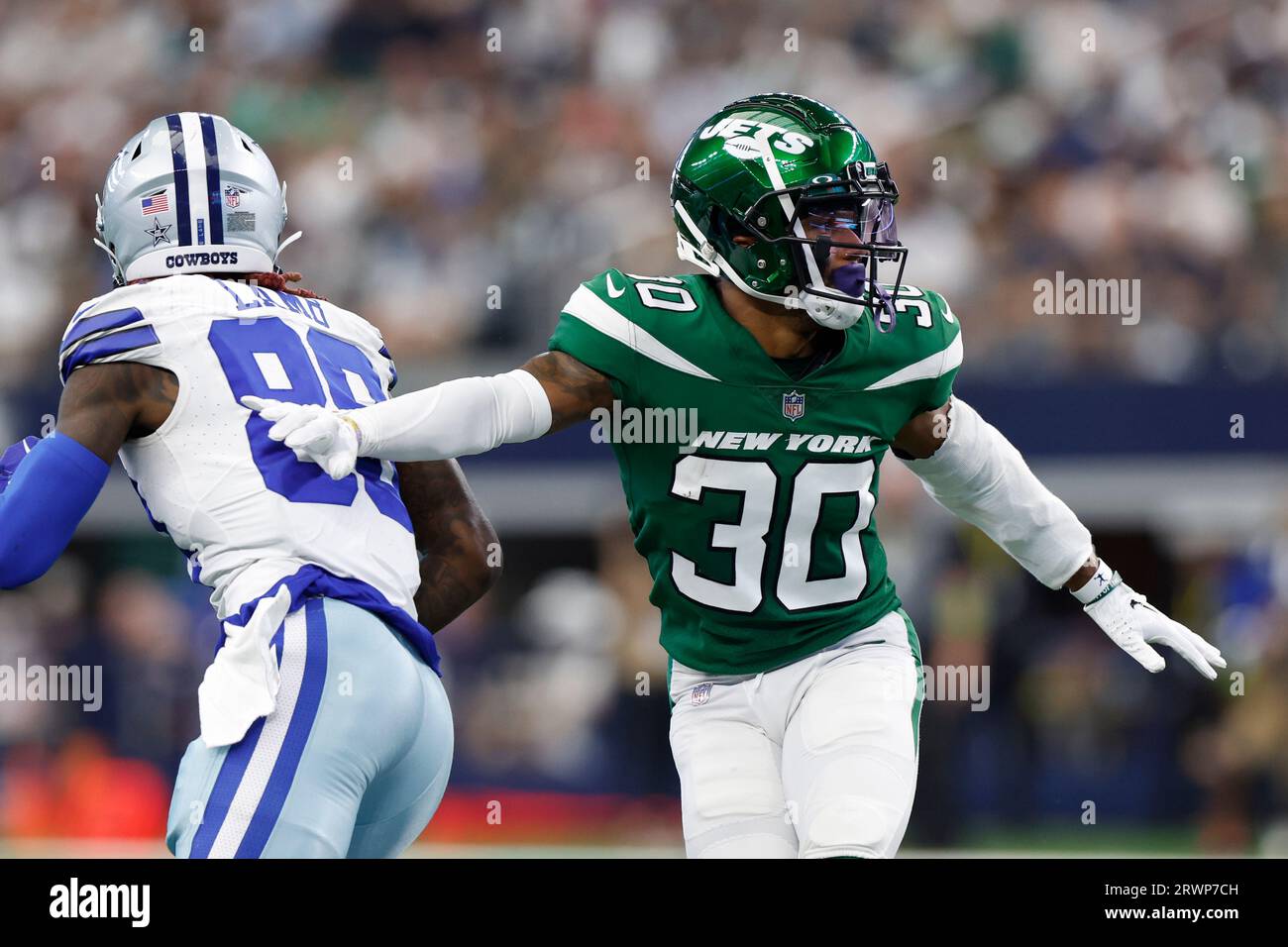 New York Jets defensive back Michael Carter II (30) defends as Cee Dee ...