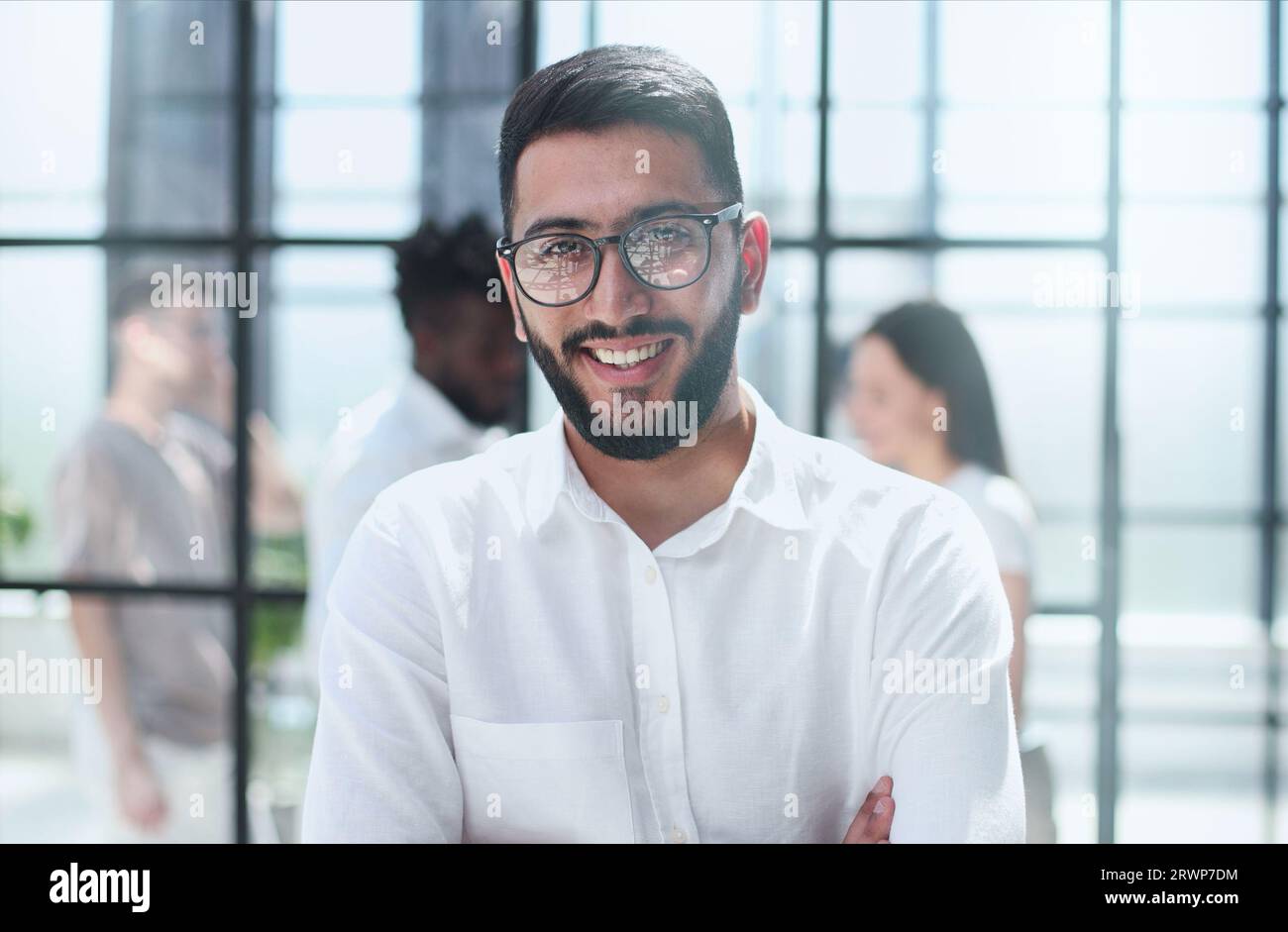 Smiling professional business leaders and employees group team portrait ...
