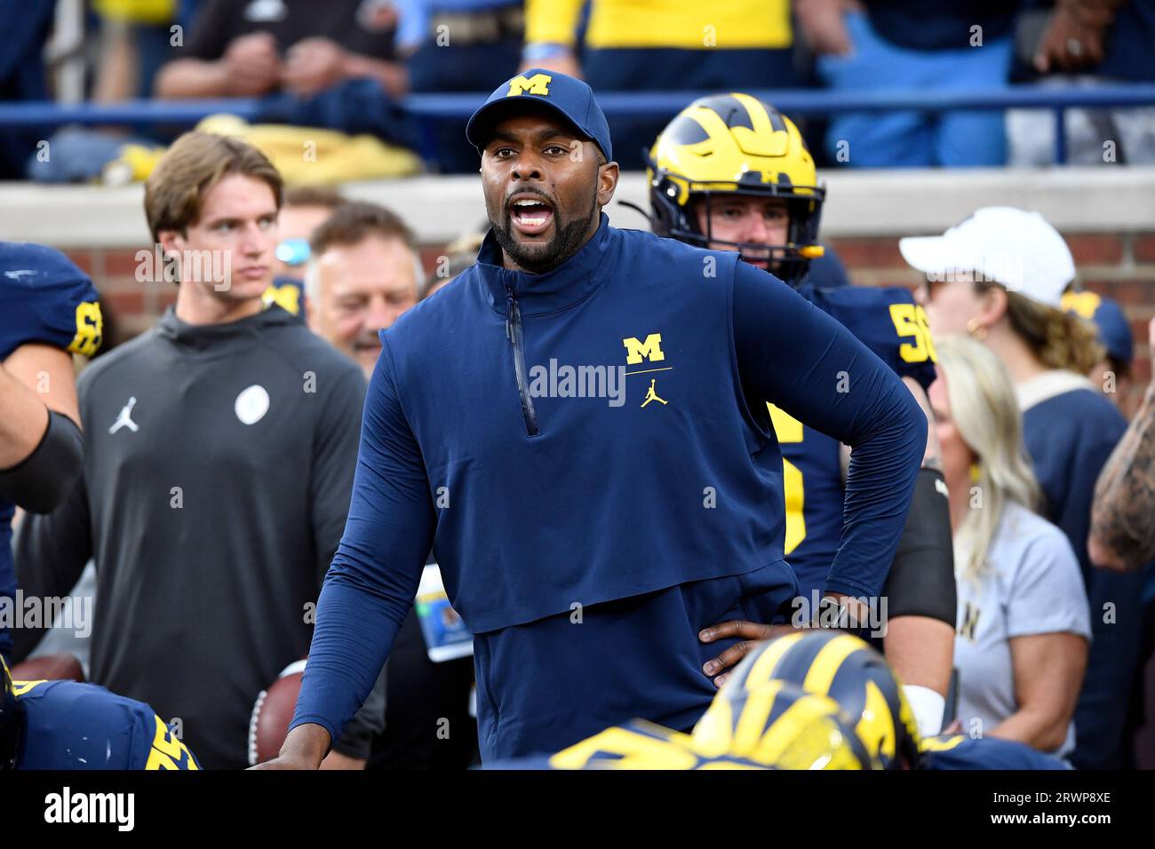 Michigan offensive coordinator Sherrone Moore yells instructions to ...