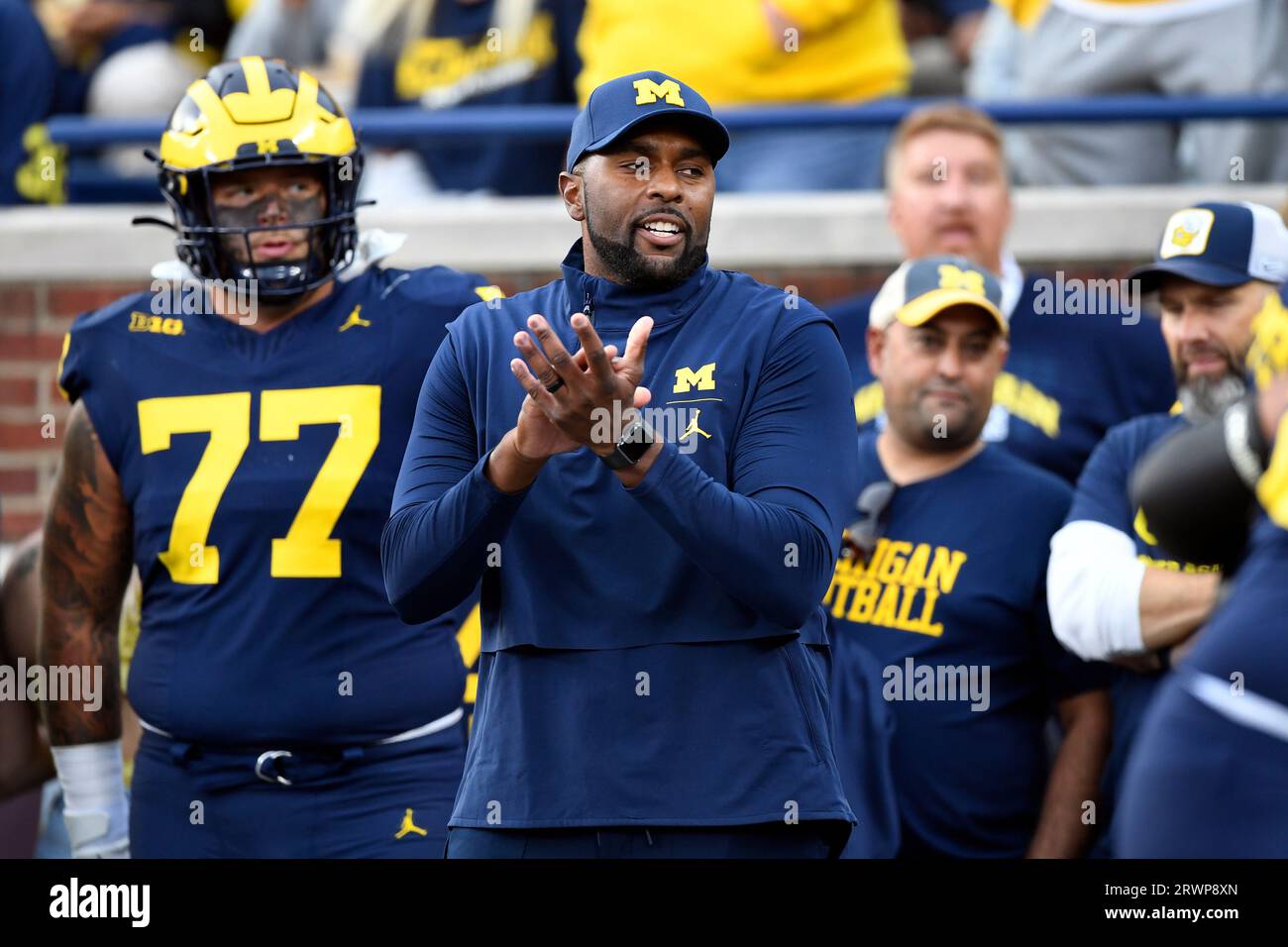 Michigan offensive coordinator Sherrone Moore cheers on the offensive ...