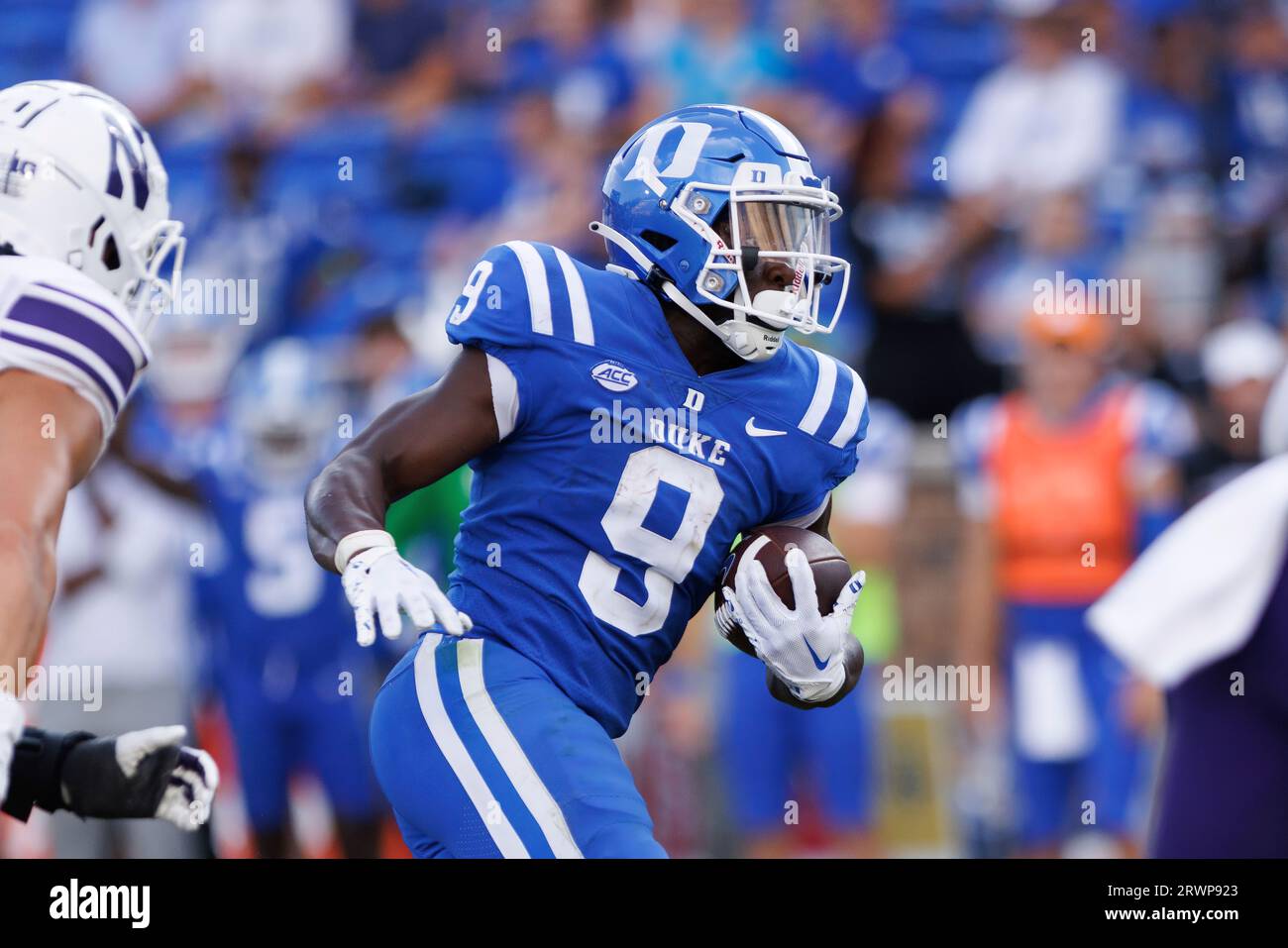 Duke's Jaquez Moore (9) carries the ball during an NCAA college ...