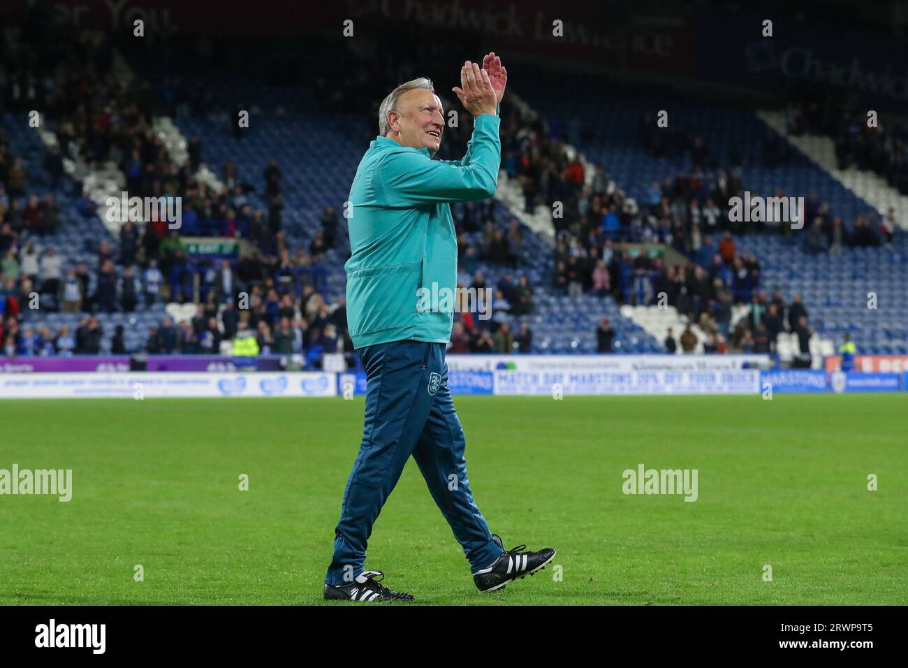 Neil Warnock manager of Huddersfield Town applauds the home fans after ...