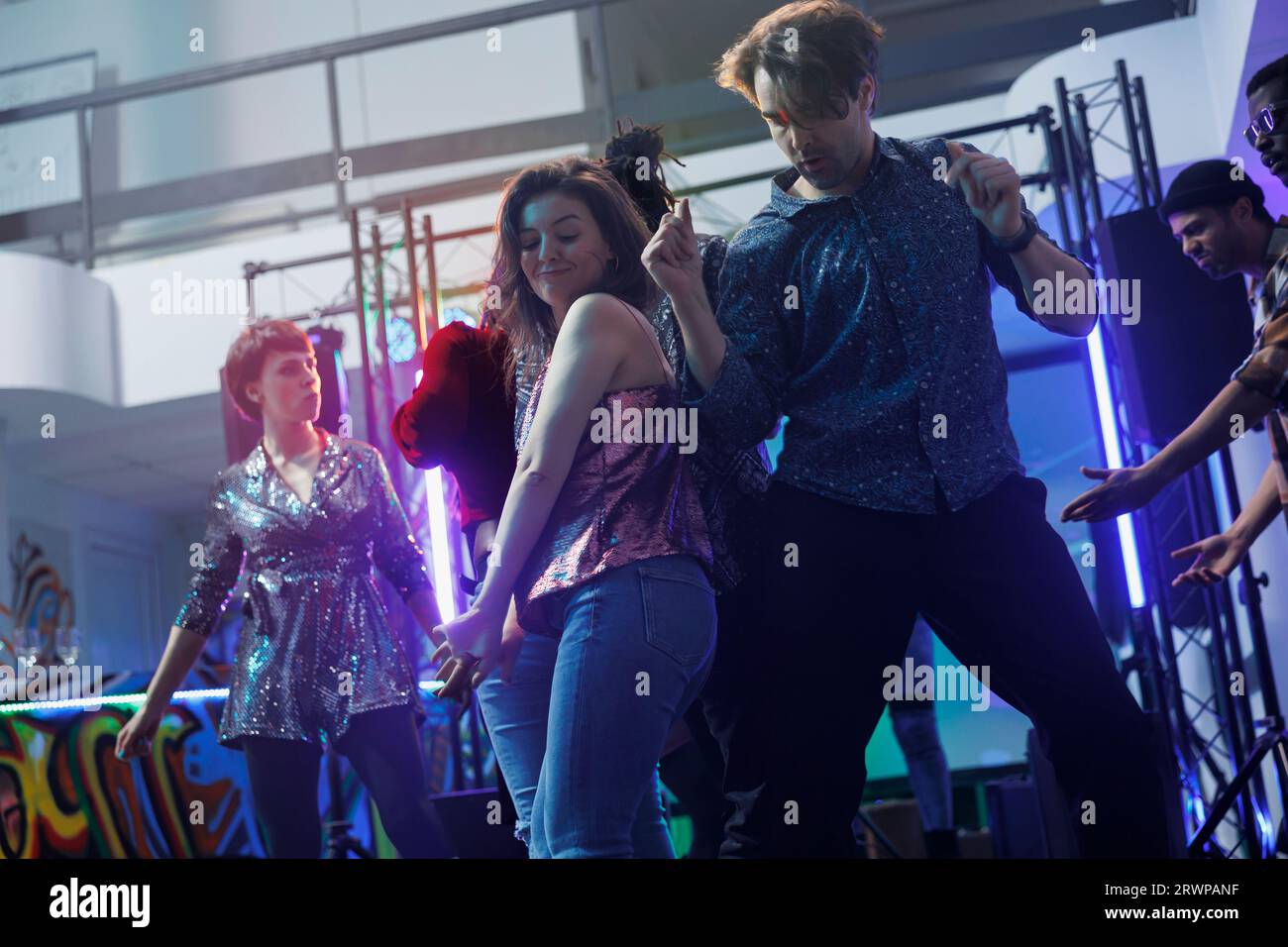 Cheerful woman showing dance moves hi-res stock photography and images ...