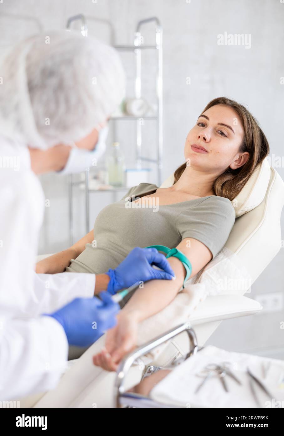 Intravenously injection young patient Stock Photo - Alamy