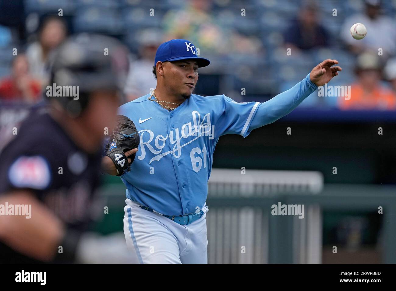 Kansas City Royals relief pitcher Angel Zerpa throws to first for the ...