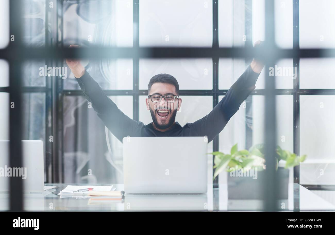 Business man sitting at his desk in the office Stock Photo - Alamy