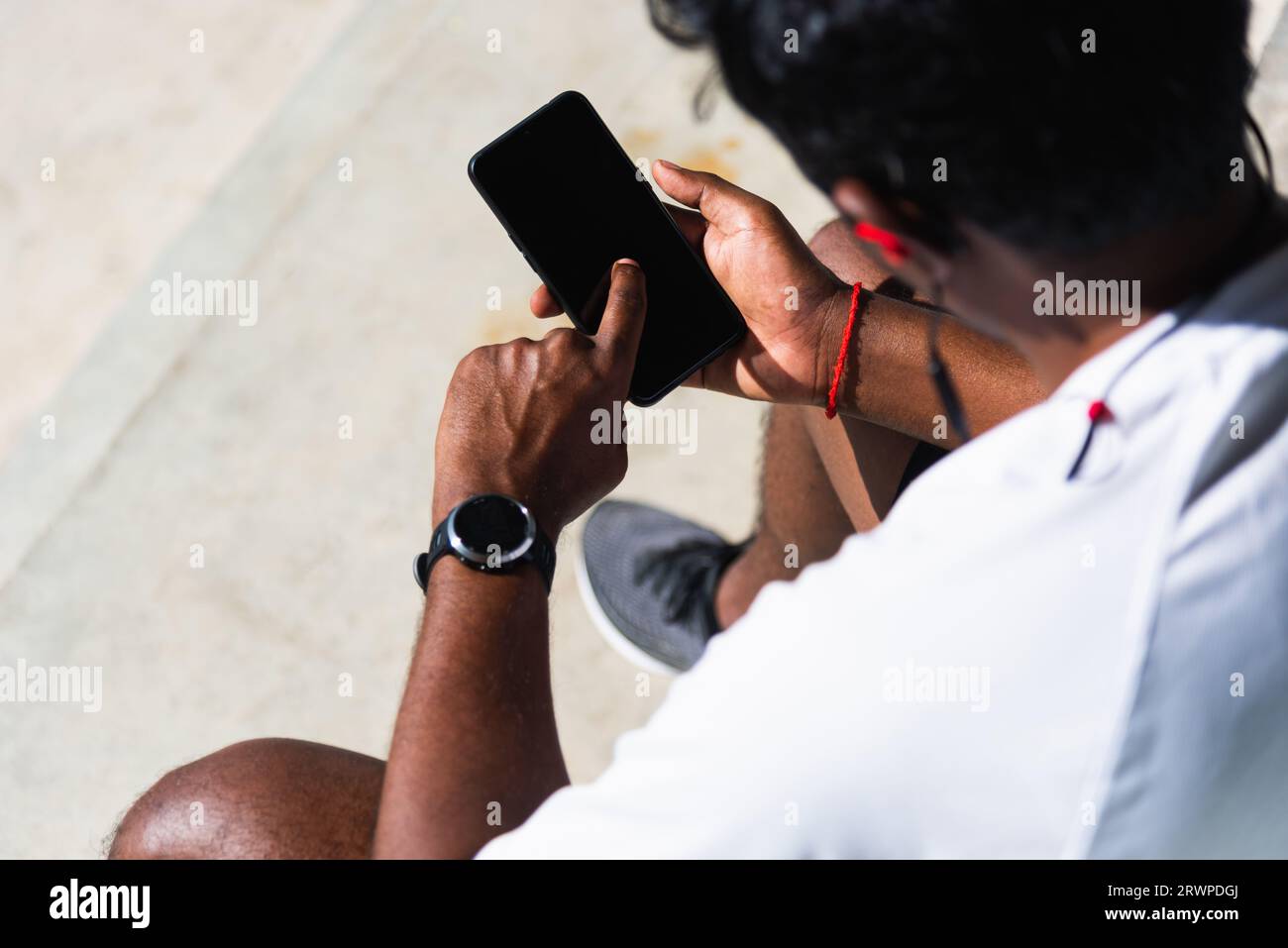 sport runner black man wear modern time smart watch Stock Photo - Alamy