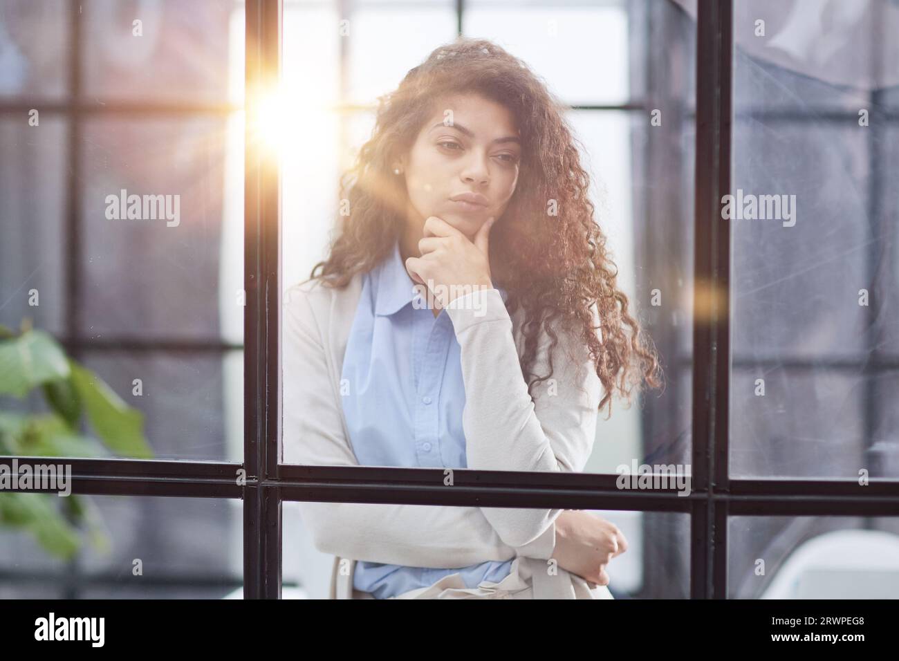 Business woman in the office outside the window Stock Photo - Alamy