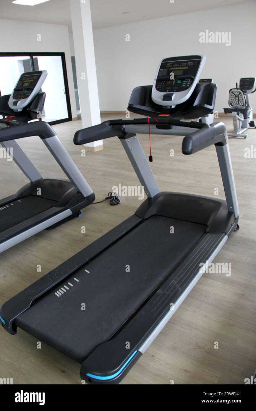 Brand new electric treadmills, exercise apparatus in gym of hotel or ...