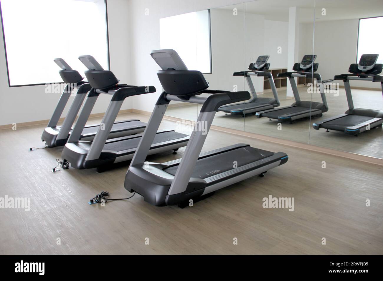 Brand new electric treadmills, exercise apparatus in gym of hotel or ...