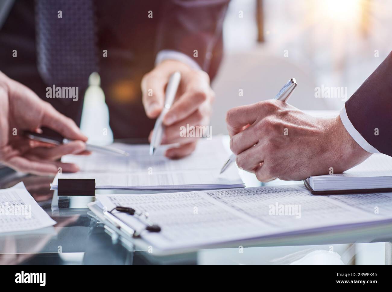 men close-up, looking in a folder with documents Stock Photo - Alamy