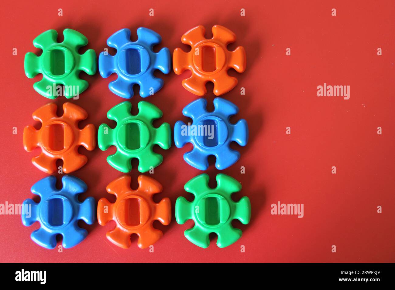 Pieces of plastic rainbow multicolored buildable toy blocks formed and ...