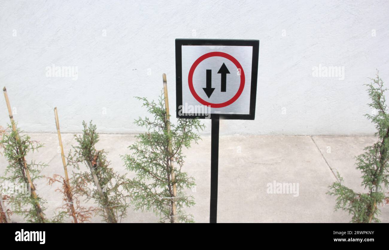 Signaling panel on the street indicating that the road is two-way and ...