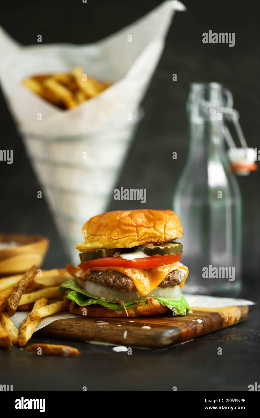 cheeseburger with fries Stock Photo - Alamy