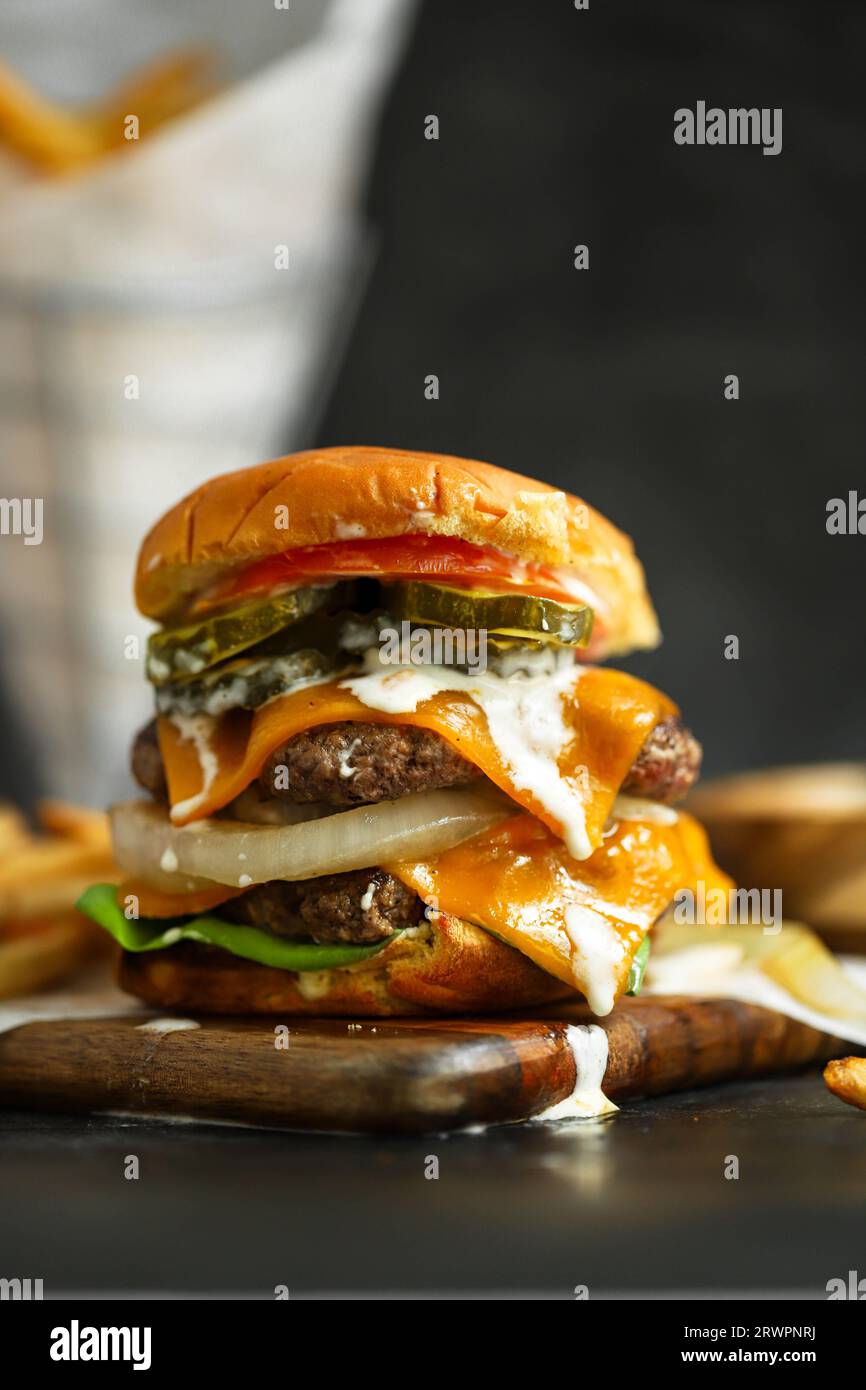 Triple cheeseburger hi-res stock photography and images - Alamy