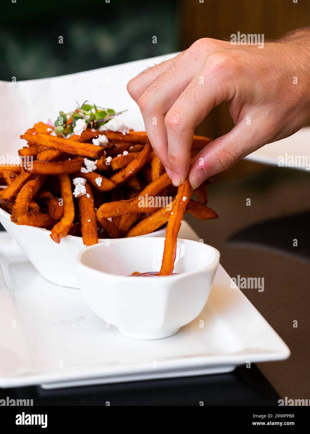 Sweet potato fry in ketchup Stock Photo - Alamy