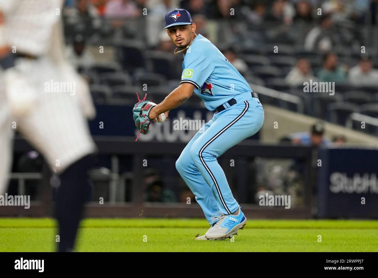Toronto Blue Jays relief pitcher Jordan Hicks fields a ground ball ...