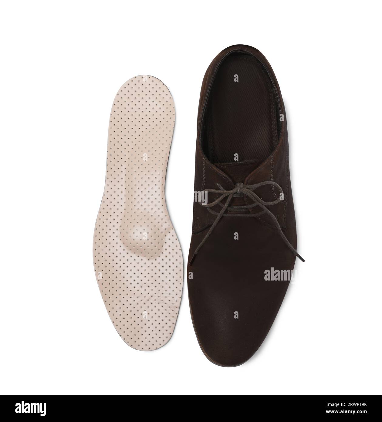 Orthopedic insole near shoe on white background, top view Stock Photo ...